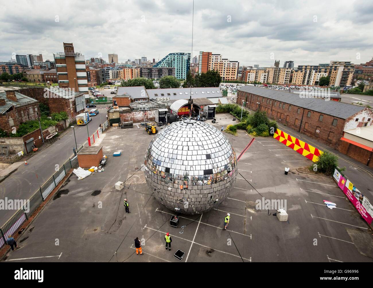 The world's largest disco ball is installed at the Duke Studios in ...