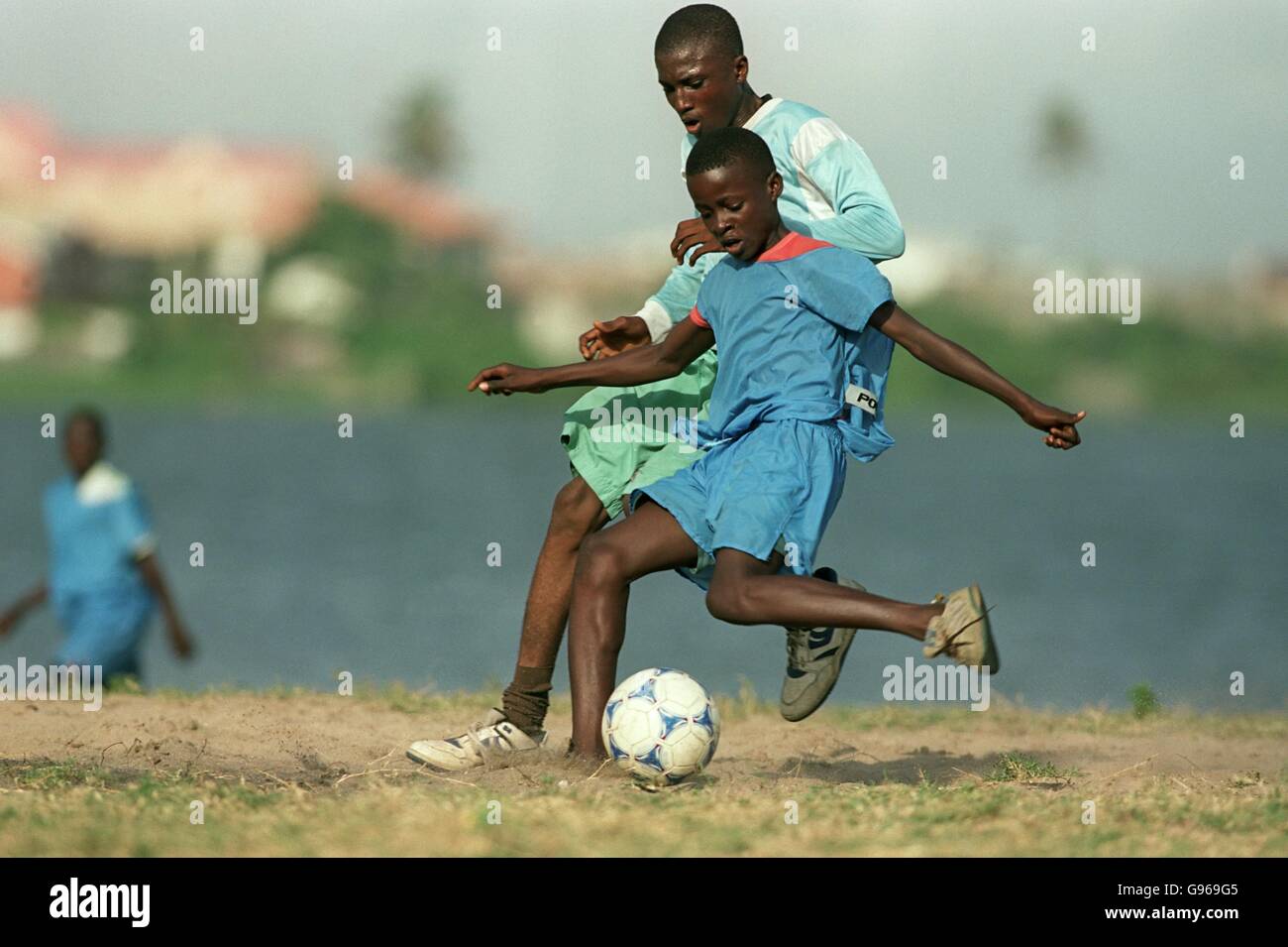 Soccer - FIFA World Youth Championships - Nigeria '99. A young boy ...