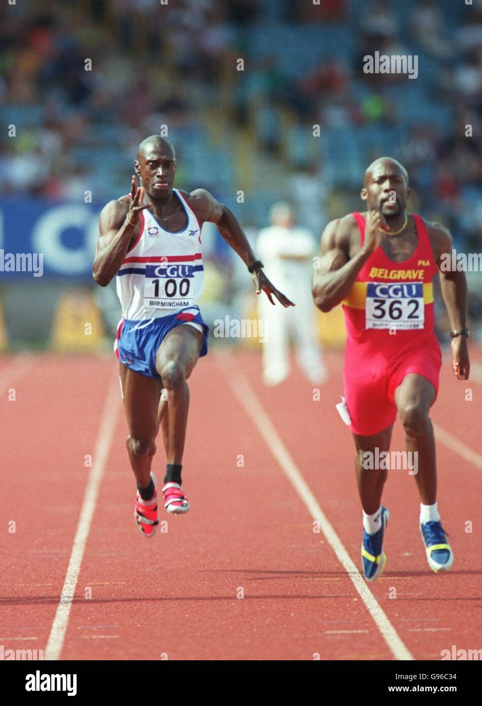 L-R; Owusu Dako & John Regis take part in the Men's 200M event Stock ...