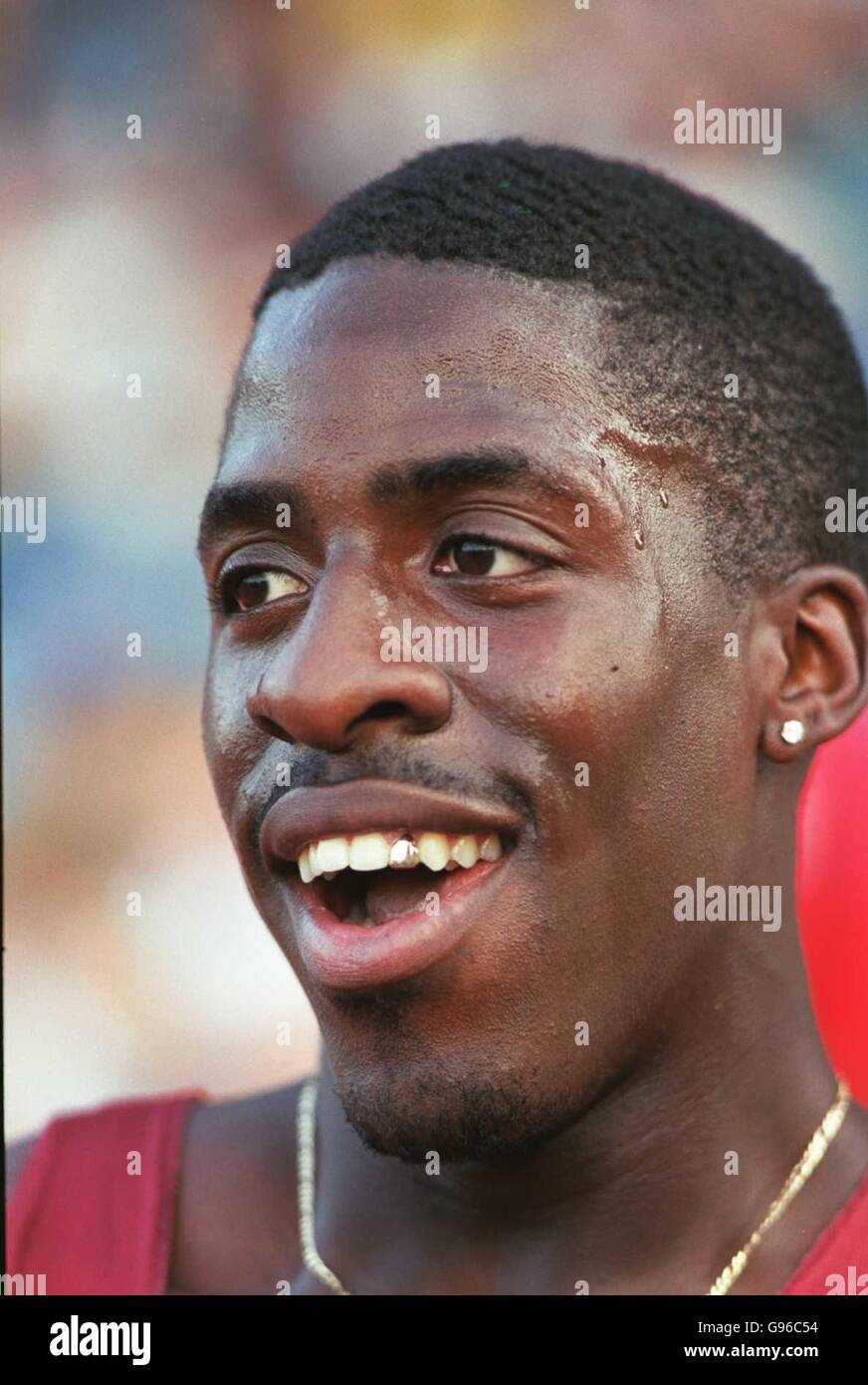 Dwain Chambers looks pleased with his performance after winning his ...