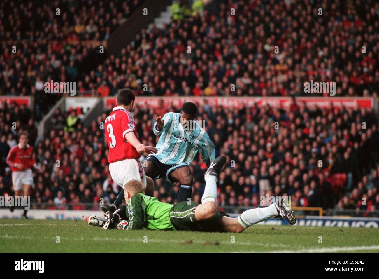 Middlesbrough's Hamilton Ricard swoops to sweep past Peter Schmeichel ...