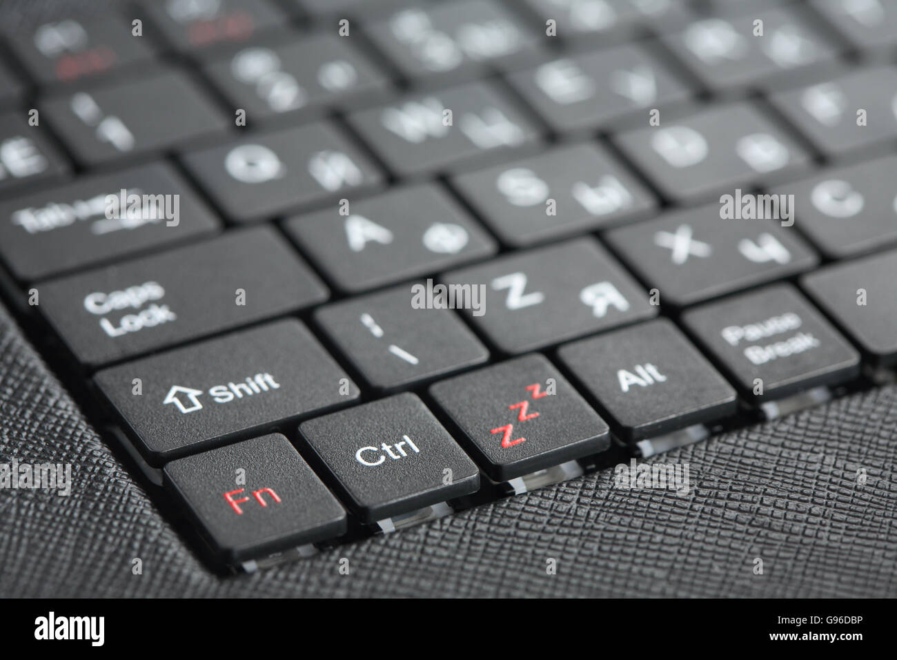 Technology background. Closeup of new black laptop keyboard Stock Photo ...