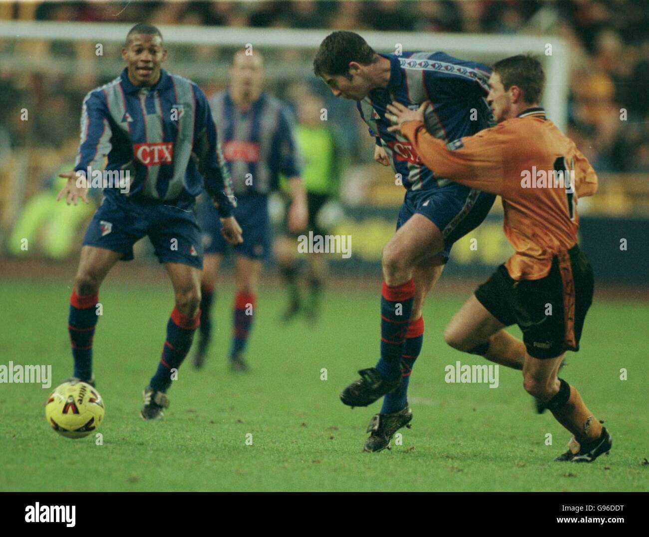 Wolverhampton Wanderers' Simon Osborne (r) pulls back Watford's Allan ...