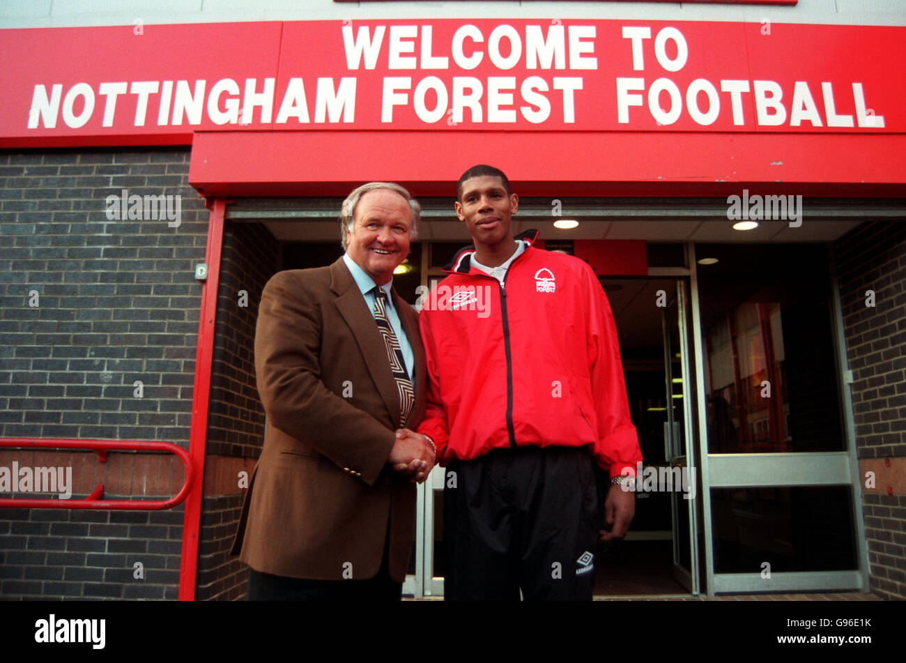 Nottingham Forest Manager Ron Atkinson greets his first signing Carlton ...