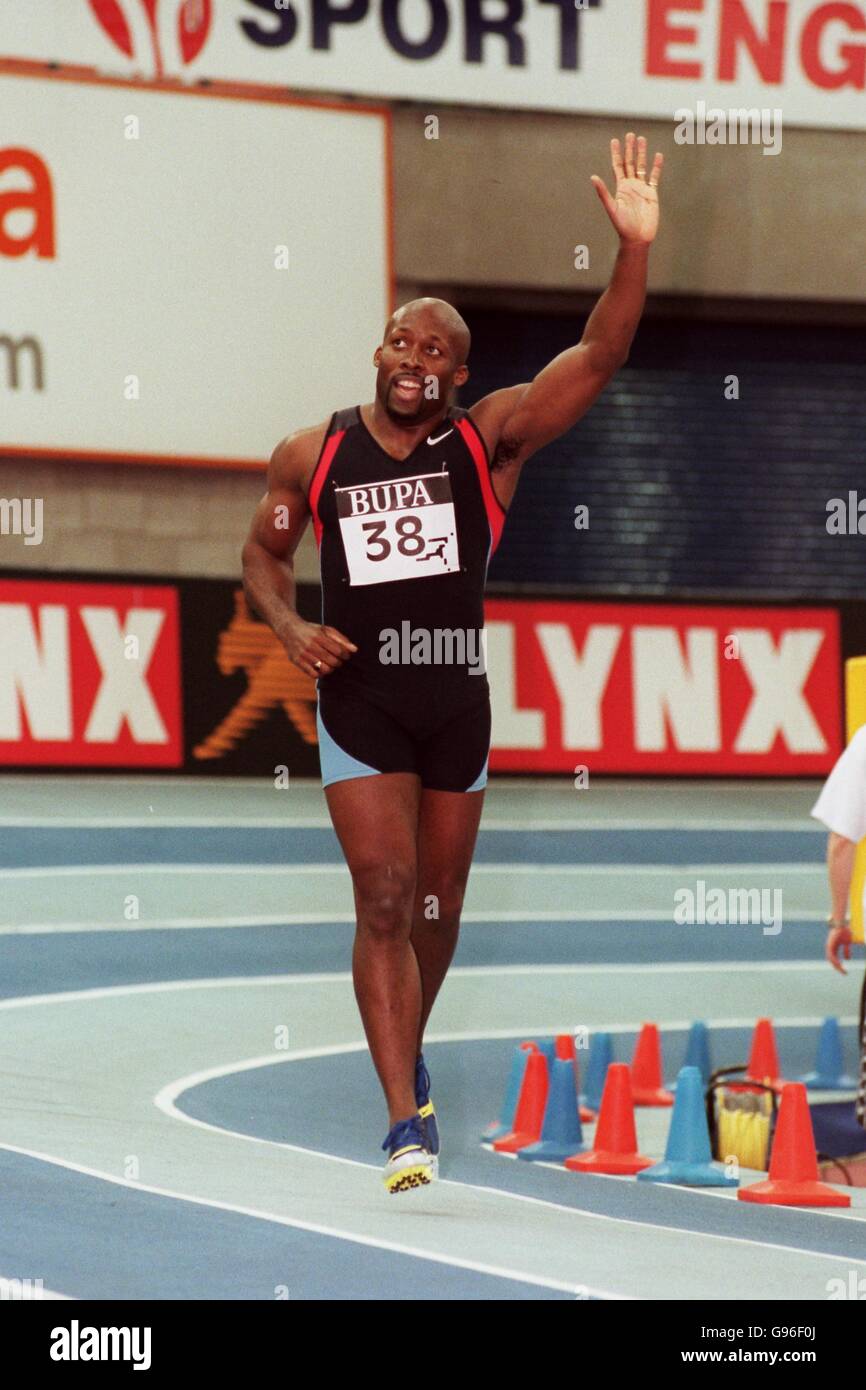 John Regis of Great Britain acknowledges the crowd after winning the ...