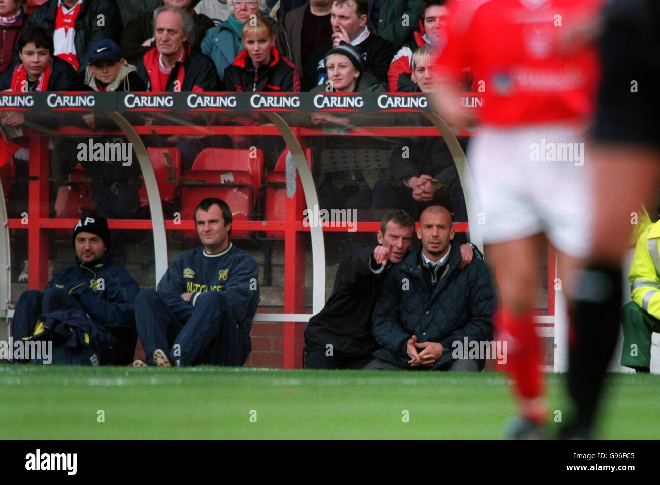 Graham Rix, Chelsea coach shows Chelsea Manager Gianluca Vialli (r) the ...