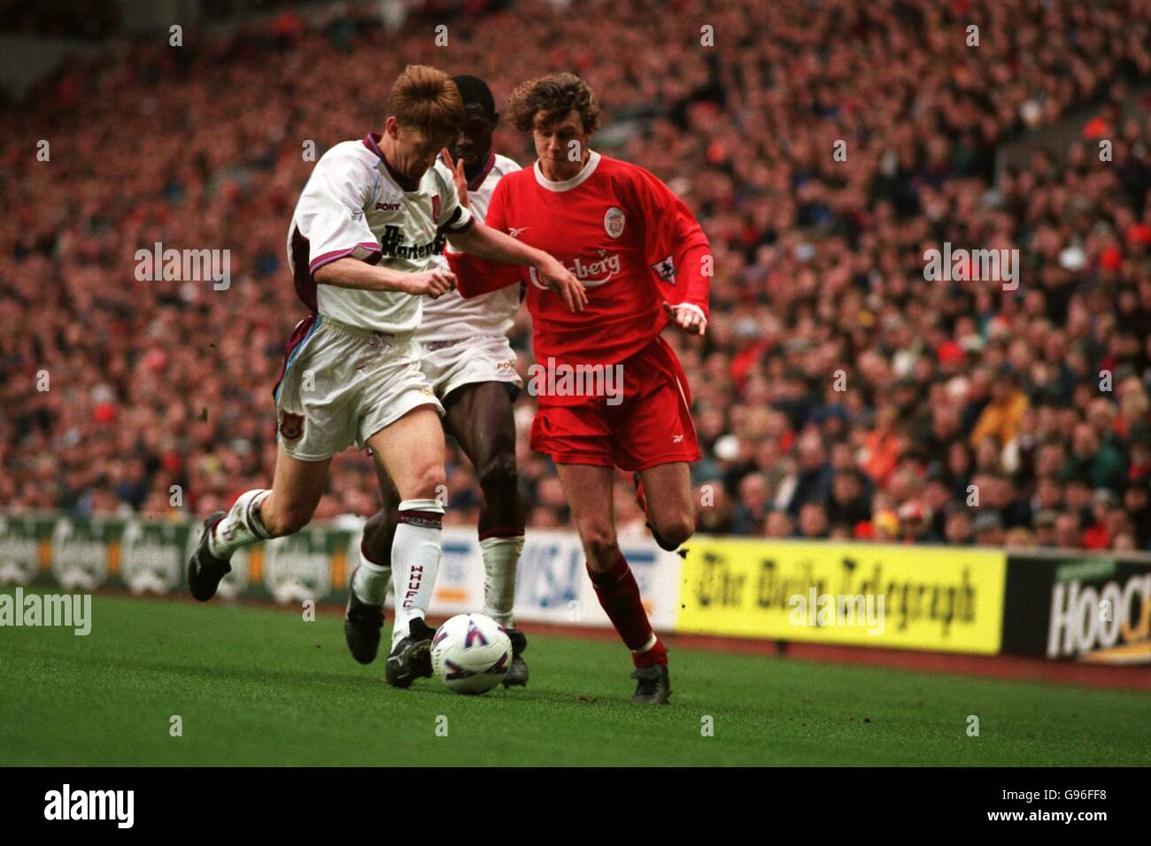 l-r; West Ham United's Steve Lomas and Marc Vivien Foe easily keep up ...