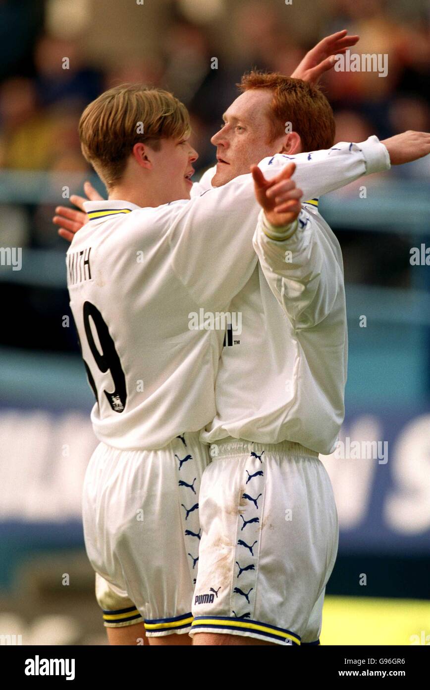 Leeds United's David Hopkin (right) celebrates his goal with Alan Smith ...