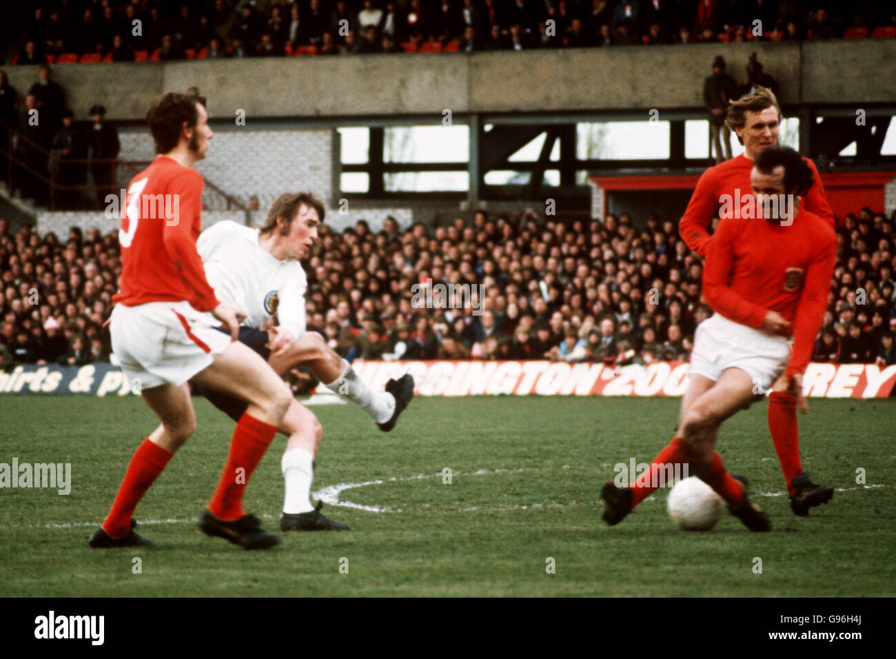 l-r Wales's Rod Thomas, Peter Rodrigues and John Roberts fail to stop ...