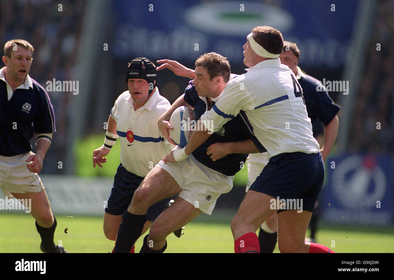 Frances olivier brouzet tackles scotlands stuart reid hi-res stock ...