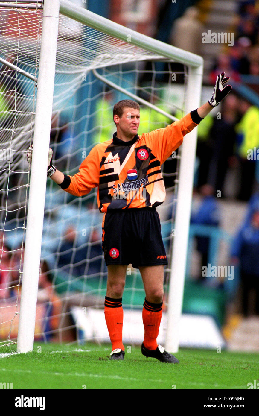 Southampton goalkeeper Neil Moss tries to get the referee's attention ...