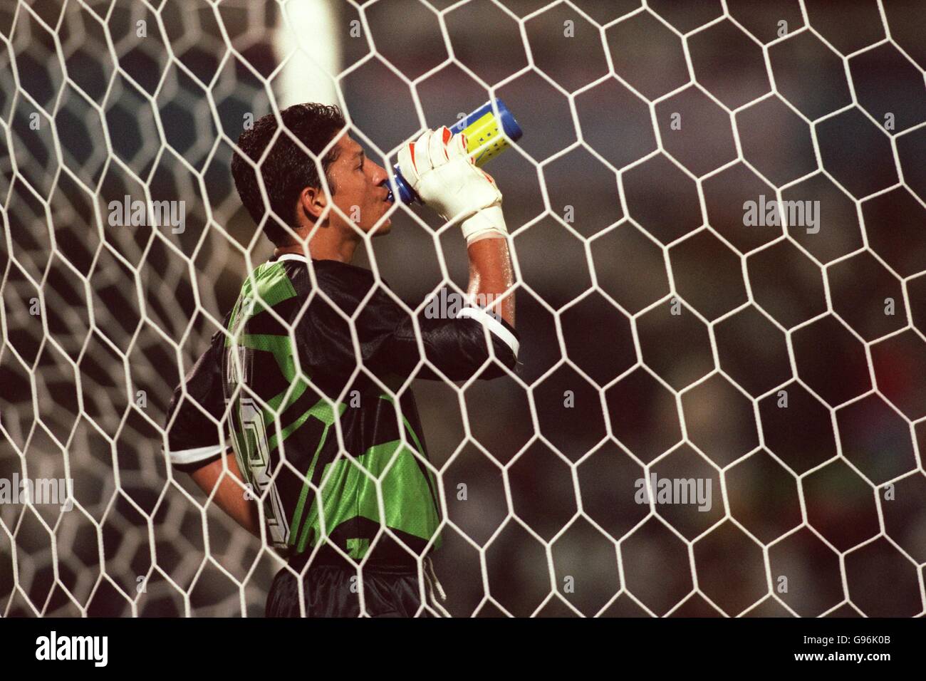 Costa Rica goalkeeper Greivin Cruz takes a drink while the ball is at ...