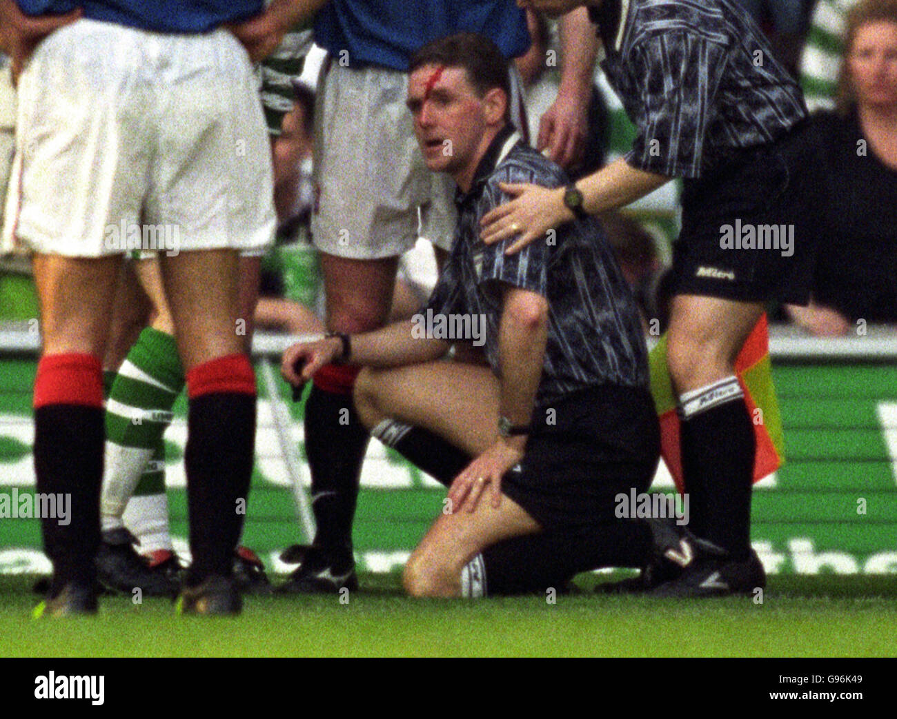 Injured blood kneeling football hi-res stock photography and images - Alamy