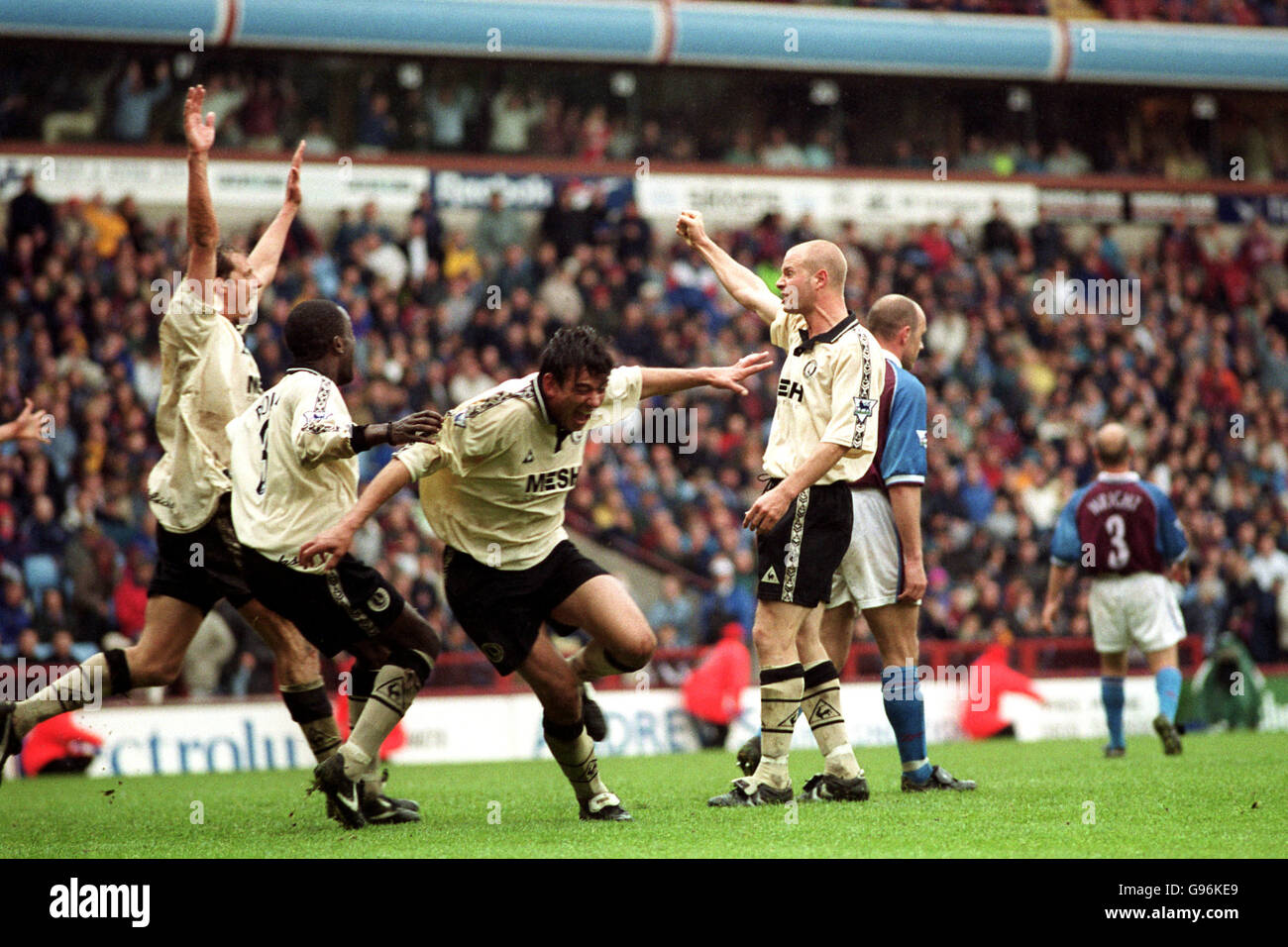 l-r; Charlton Athletic's Neil Robinson and Steve Jones rush to ...