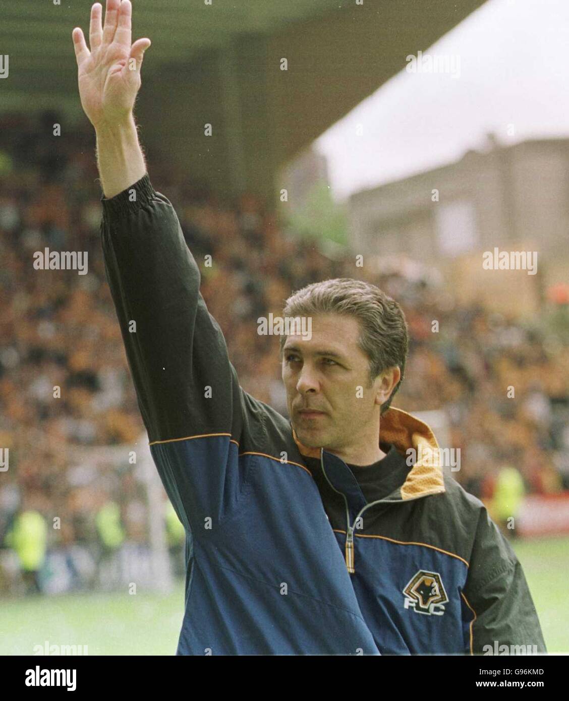 Wolves manager Colin Lee waves to the Molineaux crowd after his team ...