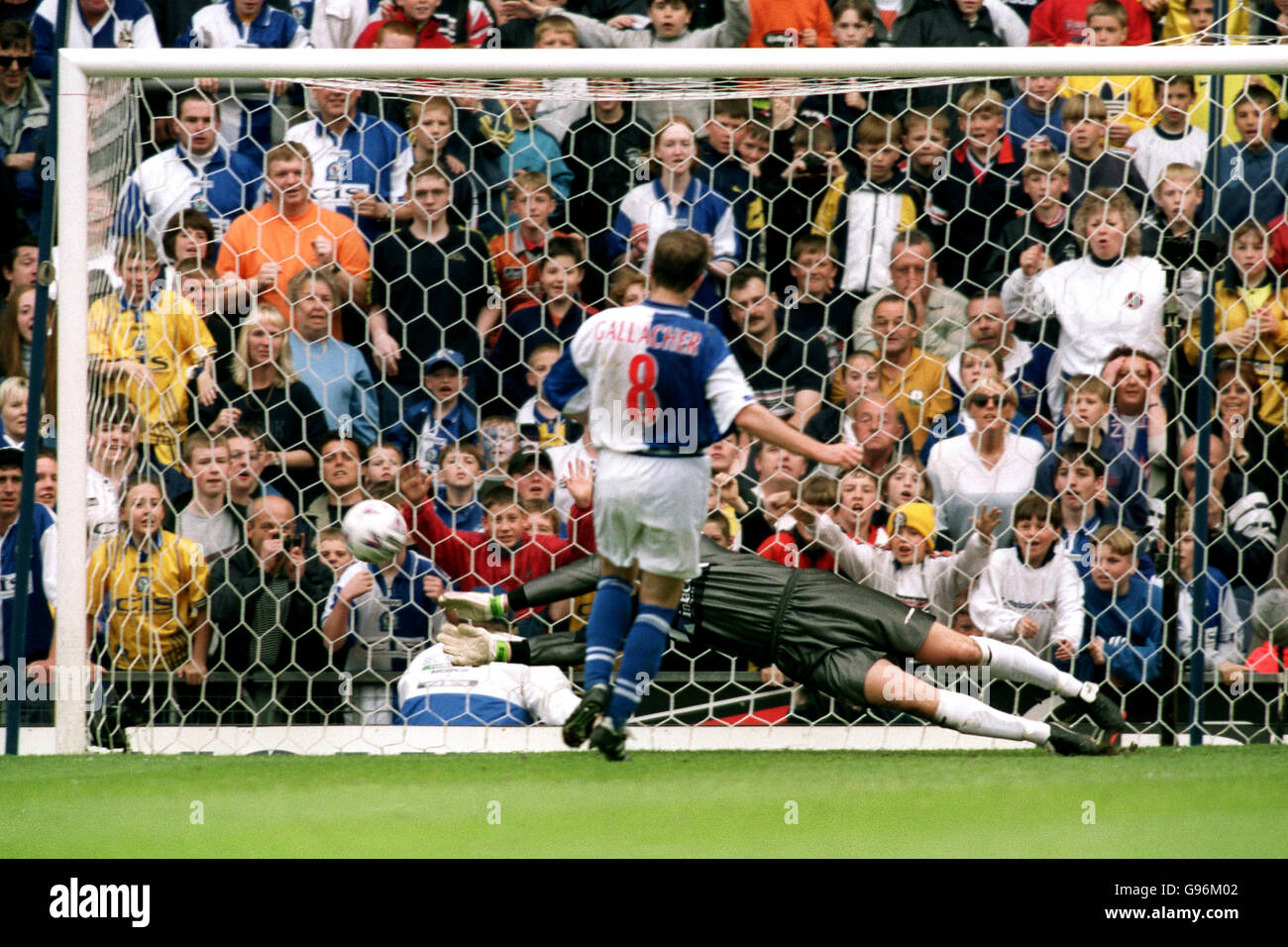 Nottingham Forest goalkeeper Mark Crossley saves a penalty from ...