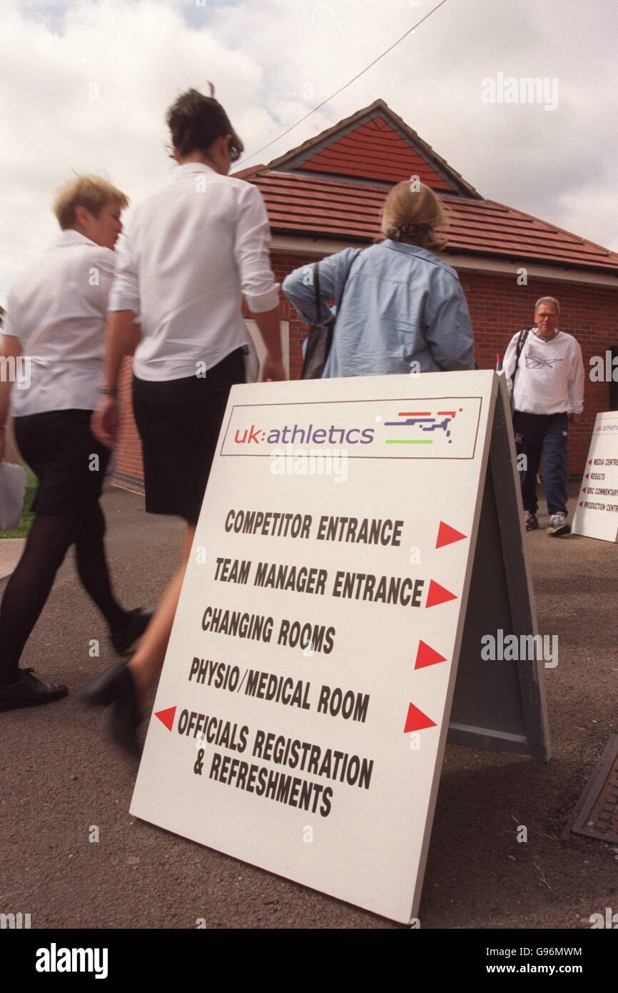 A UK Athletics signs shows directions to different areas Stock Photo ...