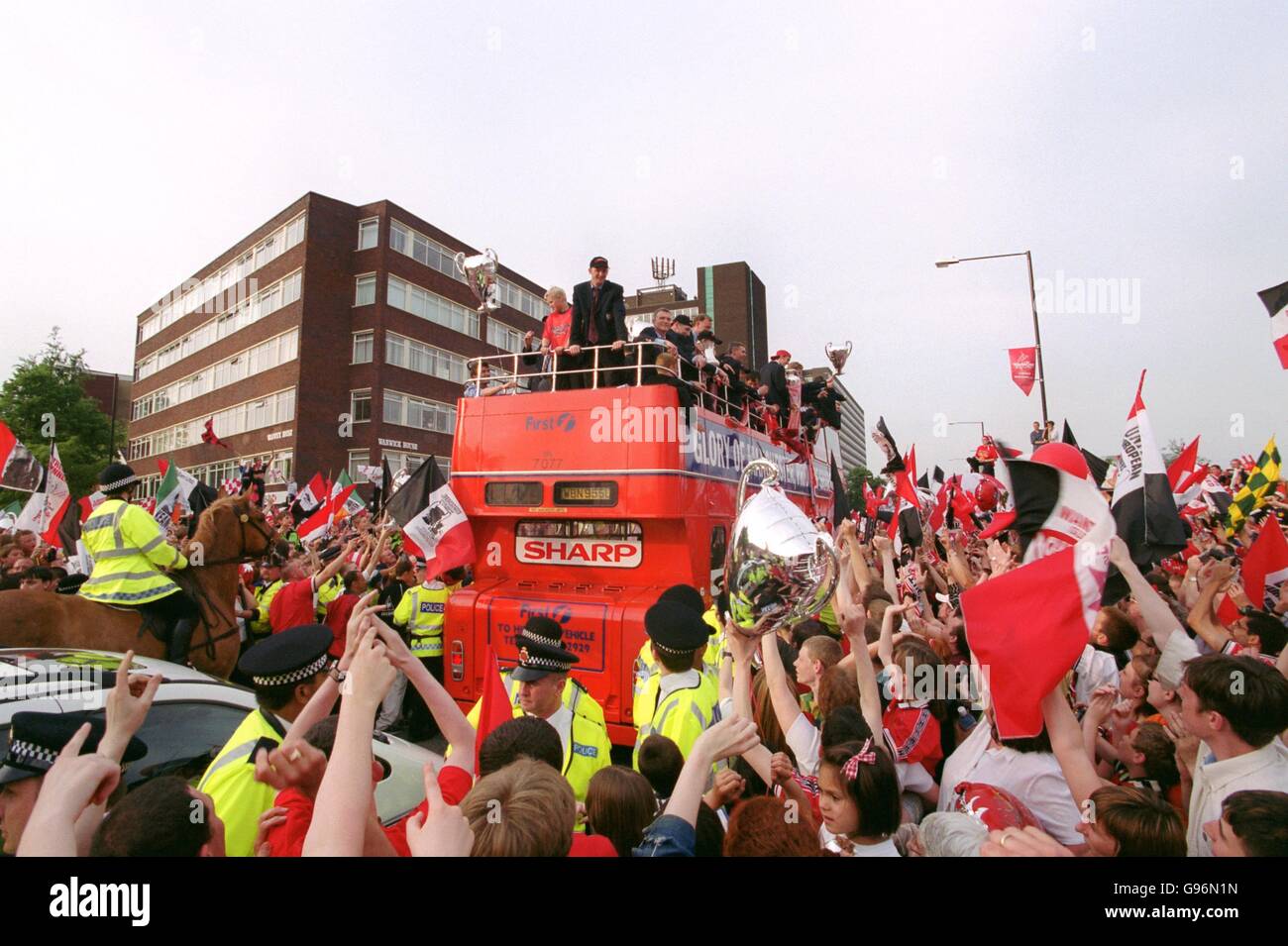 Soccer - Manchester United Return With The European Cup. The open top ...