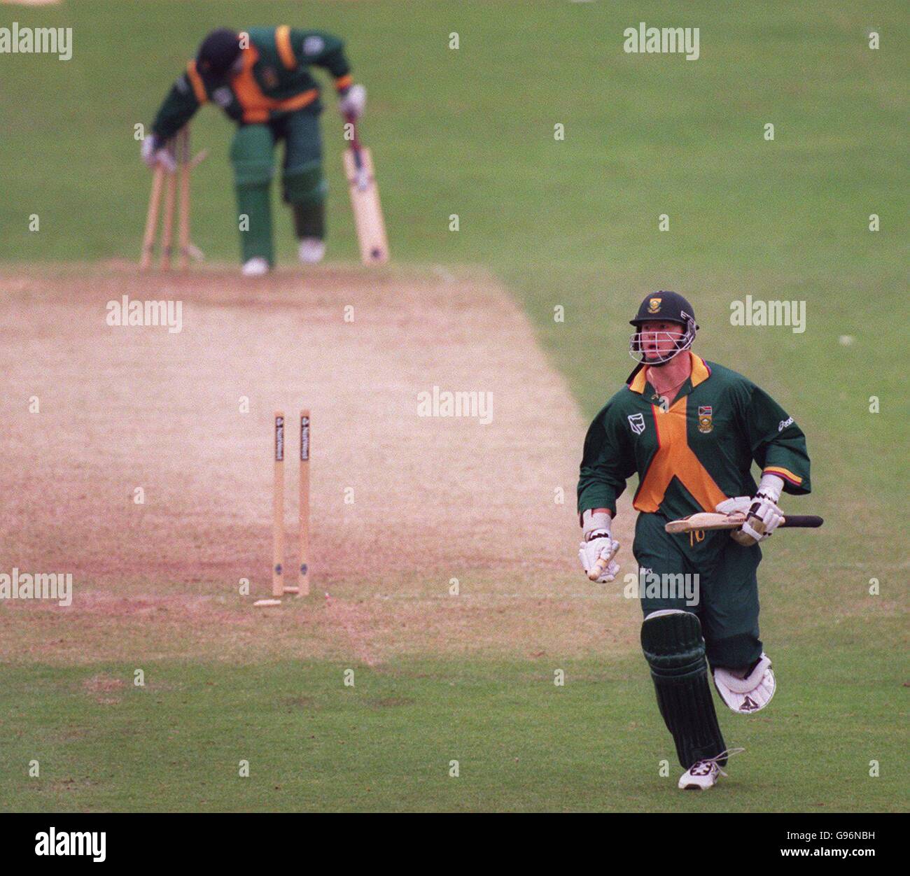South Africa's Lance Klusener and Mark Boucher make their escape after ...