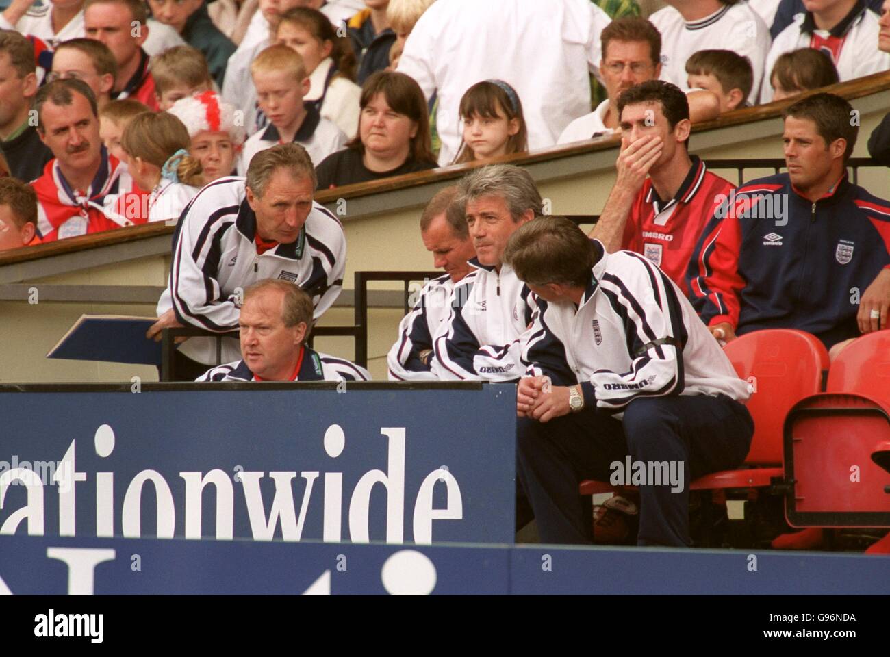 England manager Kevin Keegan (second right) sits impassive as his team ...