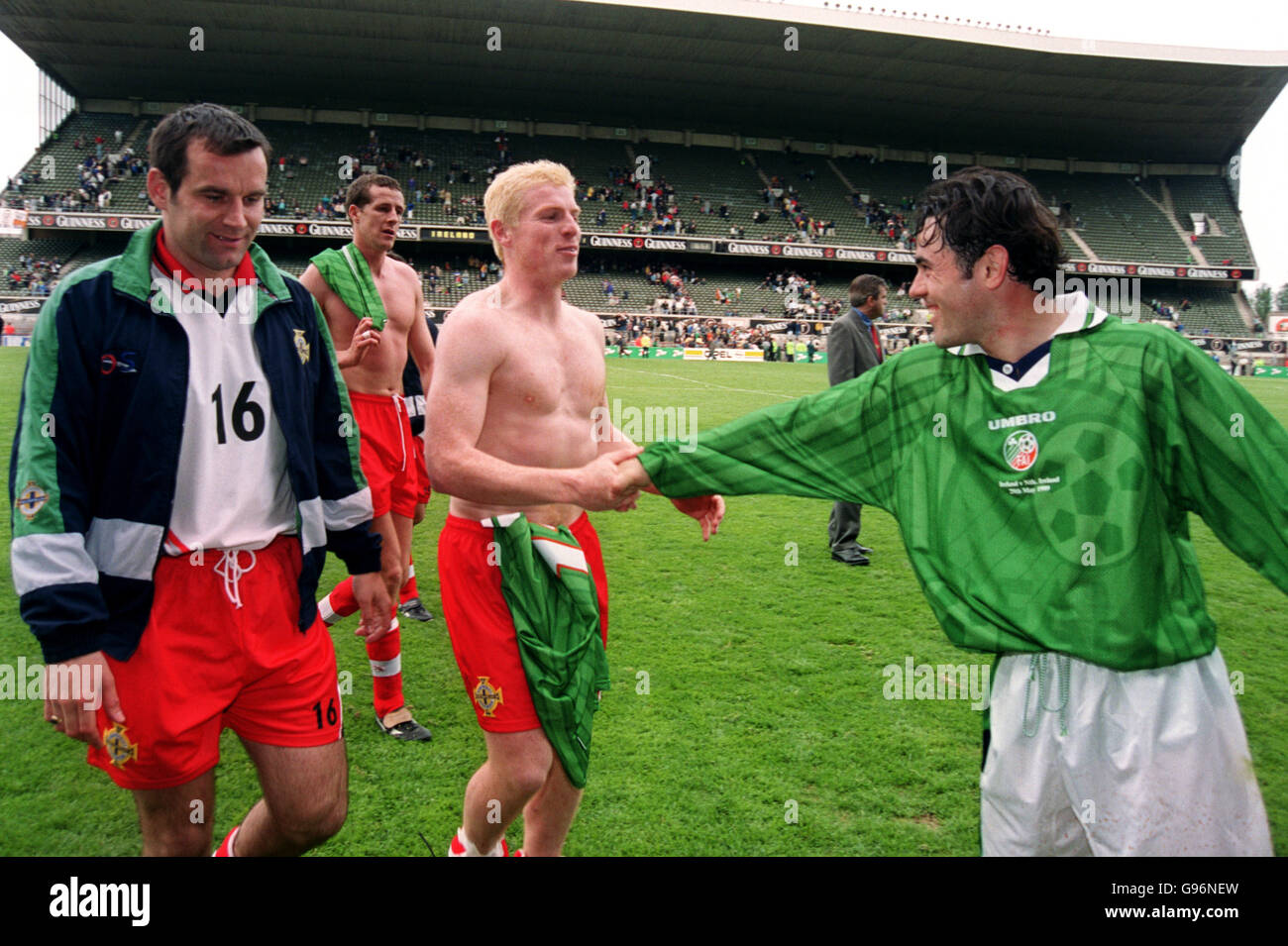 Northern Ireland's Neil Lennon (centre) shakes hands with Ireland's ...
