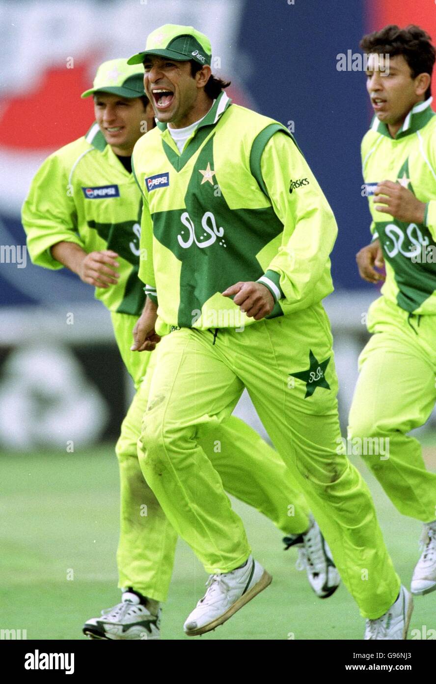 Pakistan captain Wasim Akram celebrates the wicket of India's Sachin ...
