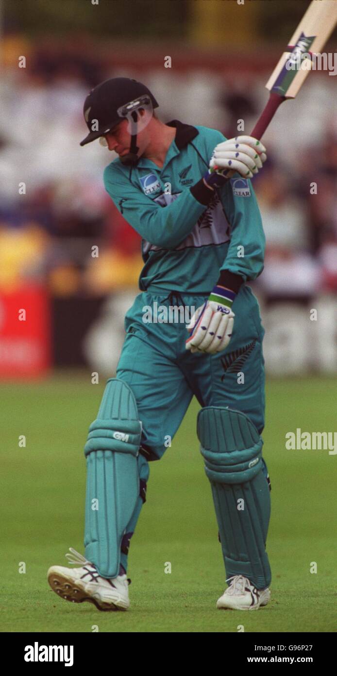 New Zealand's Matthew Horne leaves the pitch after being run out for 74 ...
