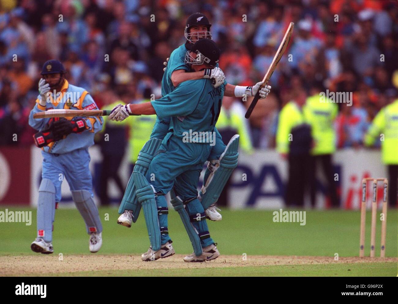 New Zealand's Roger Twose and Adam Parore celebrate helping New Zealand ...
