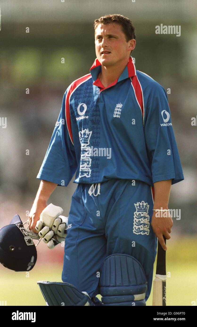 England's Darren Gough makes his way back to the pavilion after being ...
