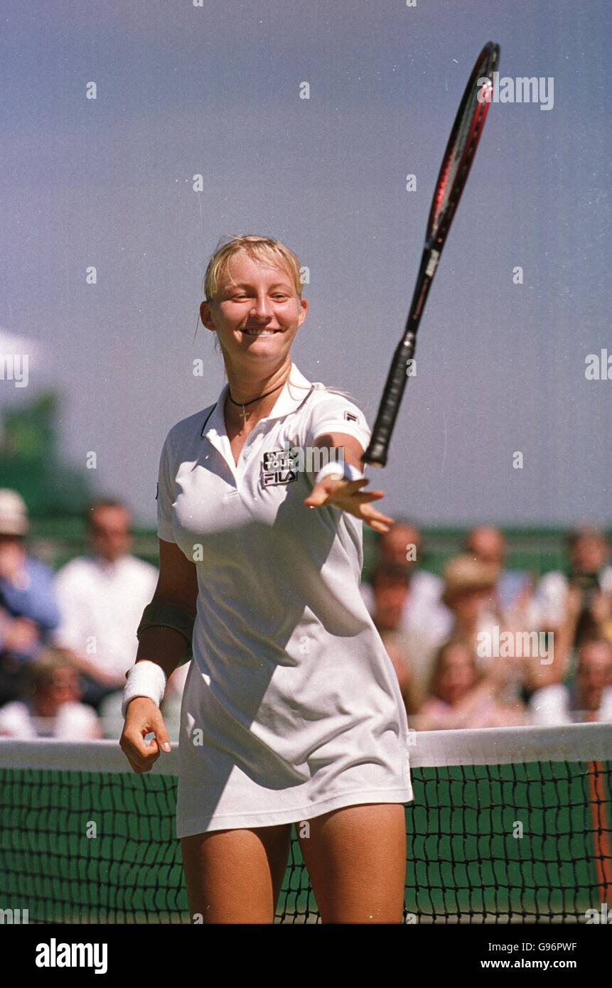 Mirjana lucicthrows her racket to celebrate victory hi-res stock ...