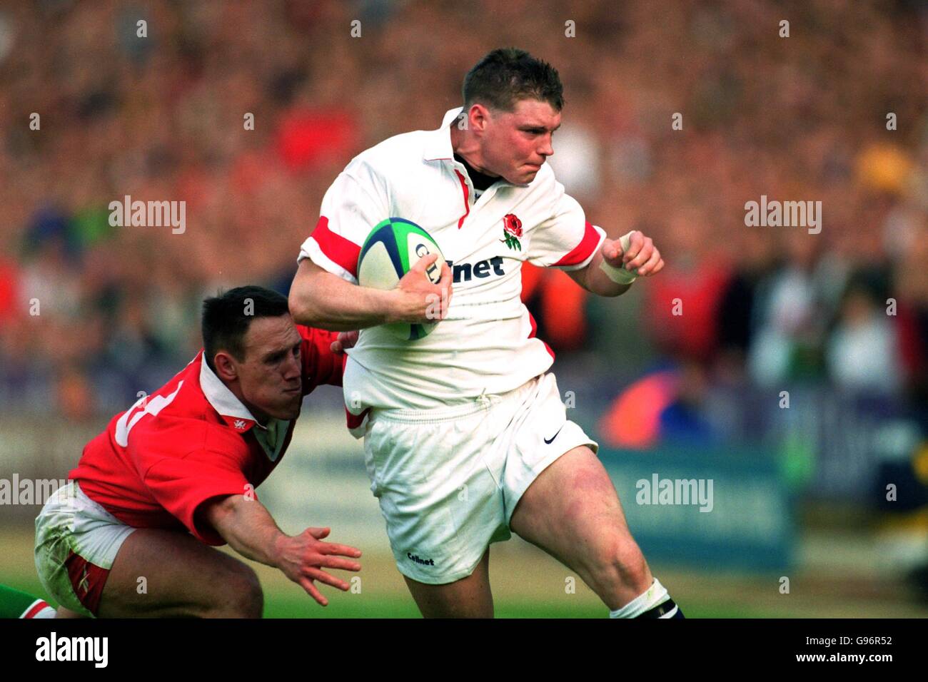 Englands steve hanley right gets away from a tackle hi-res stock ...