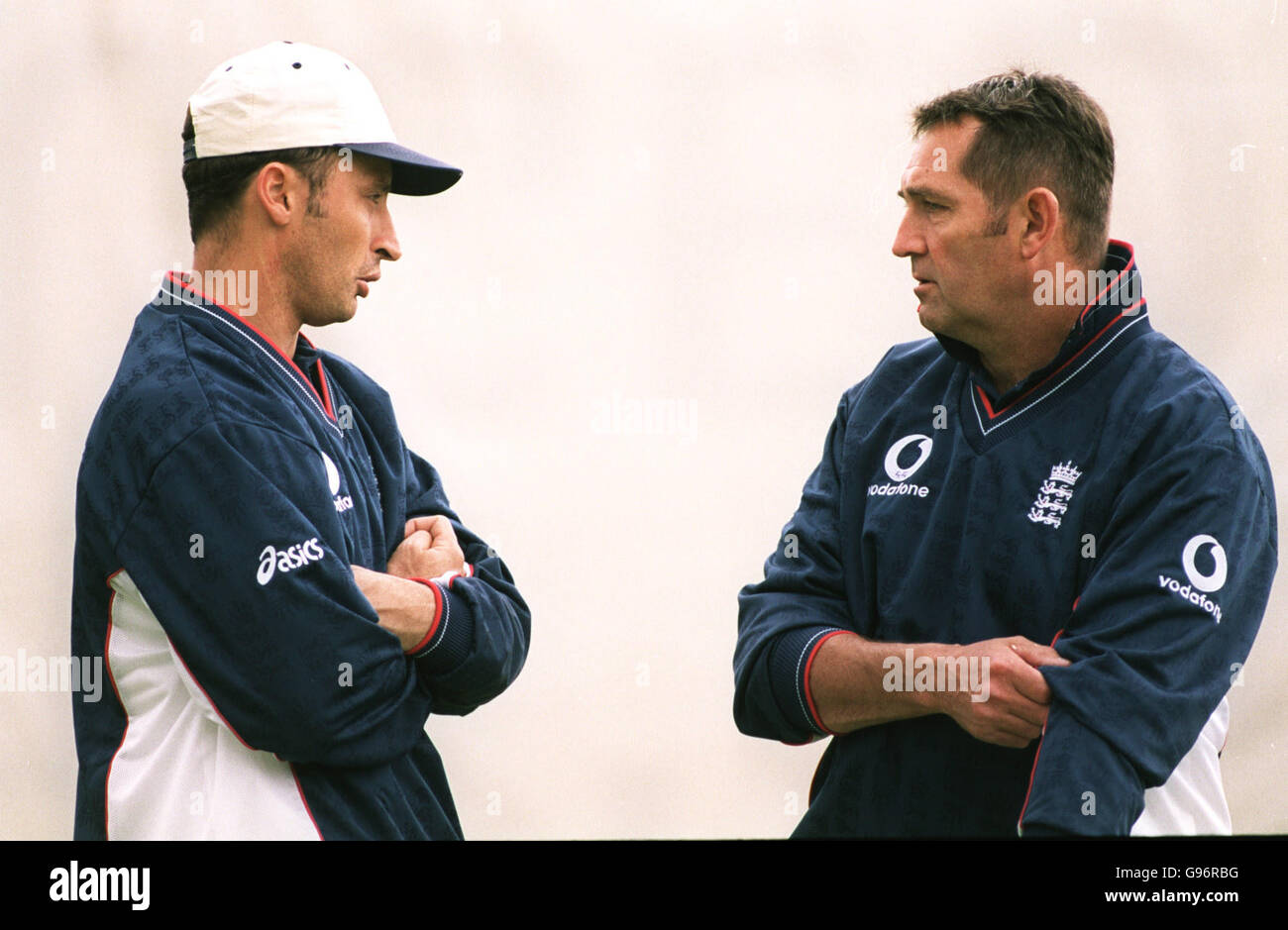 England captain Nasser Hussain (left) talks to caretaker coach Graham ...