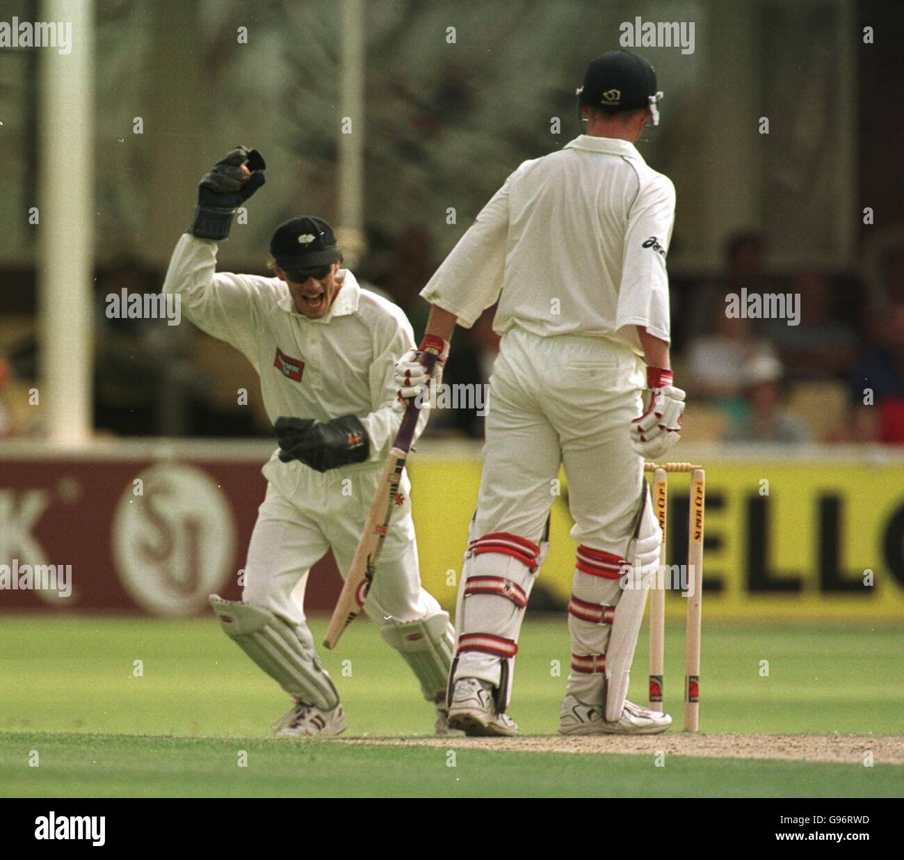 Yorkshire wicketkeeper Richard Blakey celebrates taking the wicket of ...
