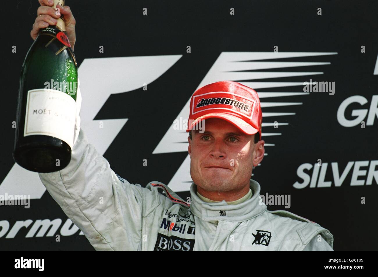 Formula One Motor Racing - British Grand Prix. David Coulthard holds ...