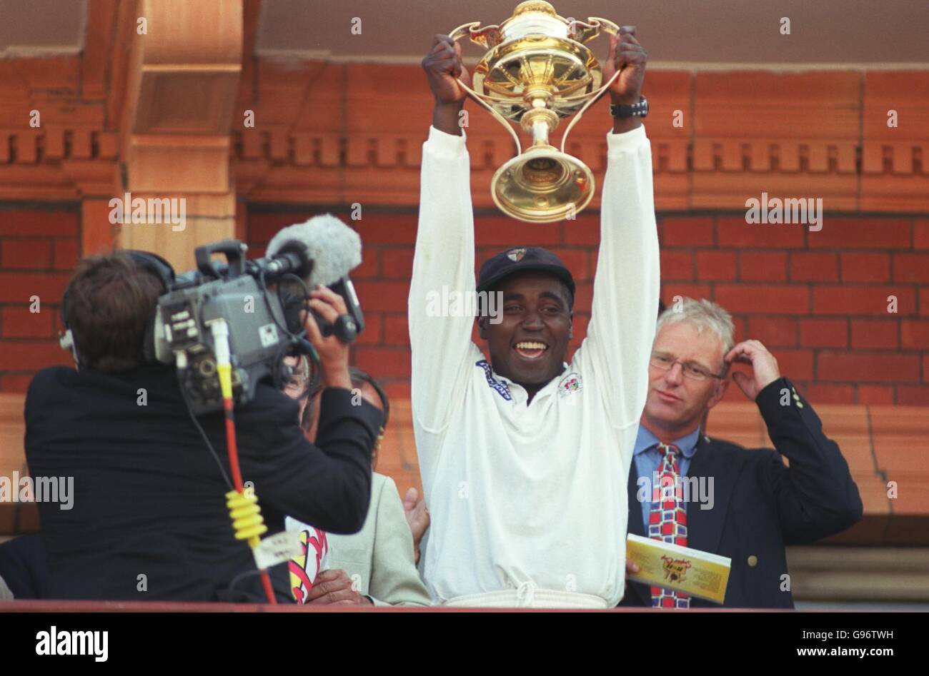 Gloucestershire captain mark alleyne lifts the super cup hi-res stock ...