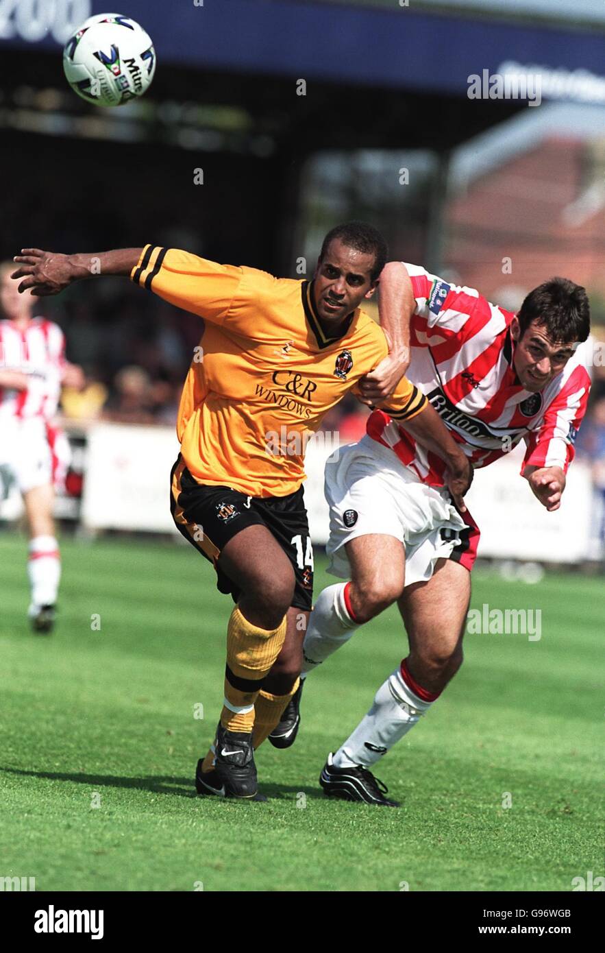Stoke City's Peter Thorne challenges Cambridges Scott Eustace for the ...