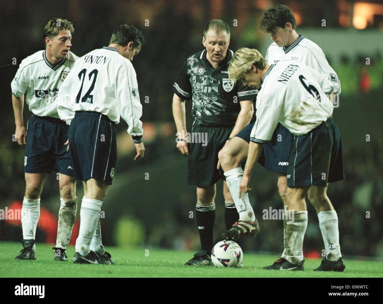 Back lines up a free kick hi-res stock photography and images - Alamy