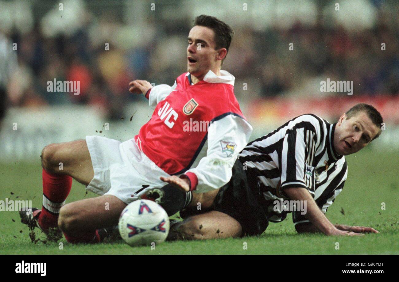 Newcastle uniteds steve howey tackles arsenals marc overmars hi-res ... Newcastle uniteds steve howey tackles arsenals marc overmars hi-res ...