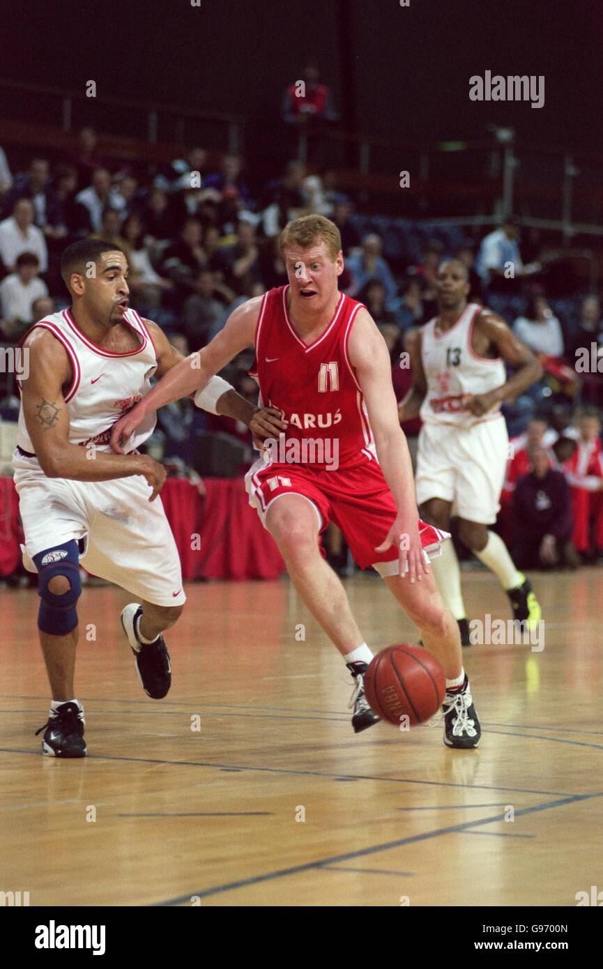 Belarus's Dmitri Kuzmin (right) takes on England's Ray Carter (left ...