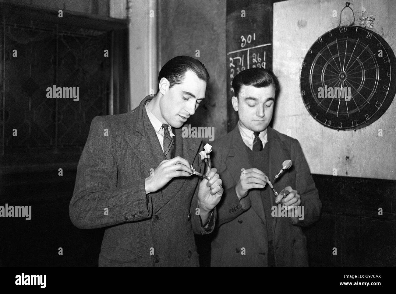 This picture, taken in a London public house, shows two men playing ...