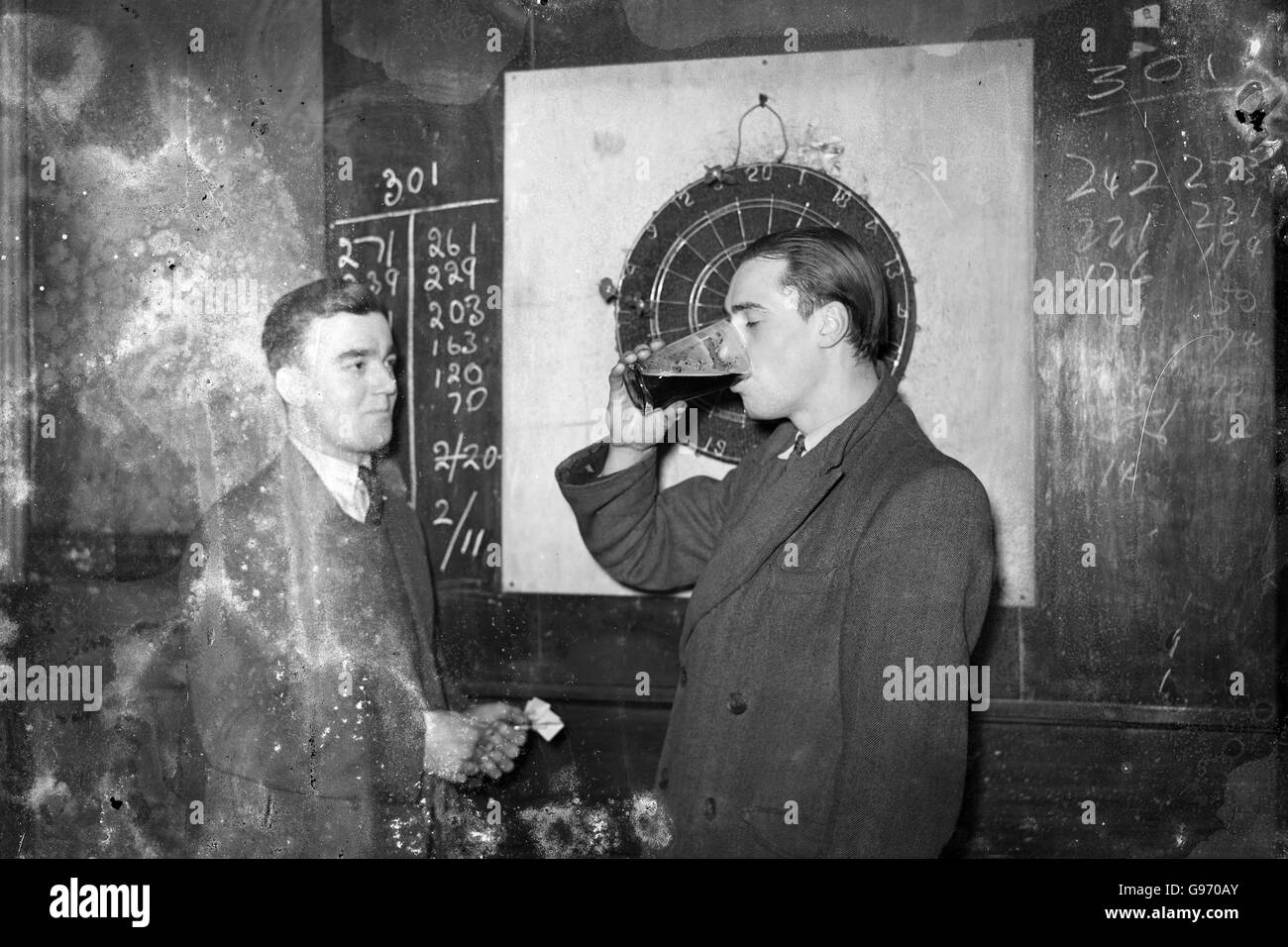 This picture, taken in a London public house, shows two men playing ...