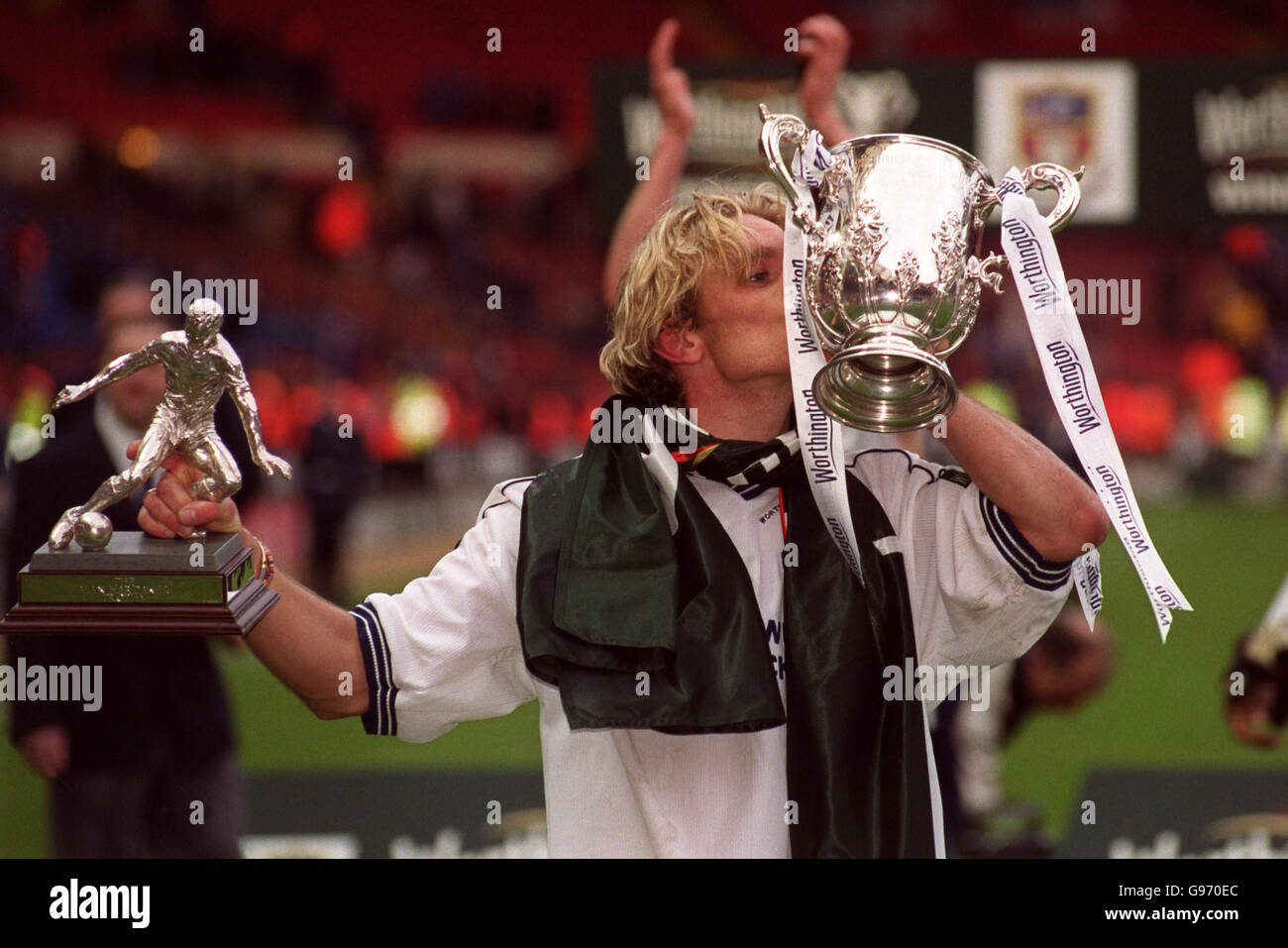 Tottenham hotspurs allan nielsen celebrates with the cup hi-res stock ...