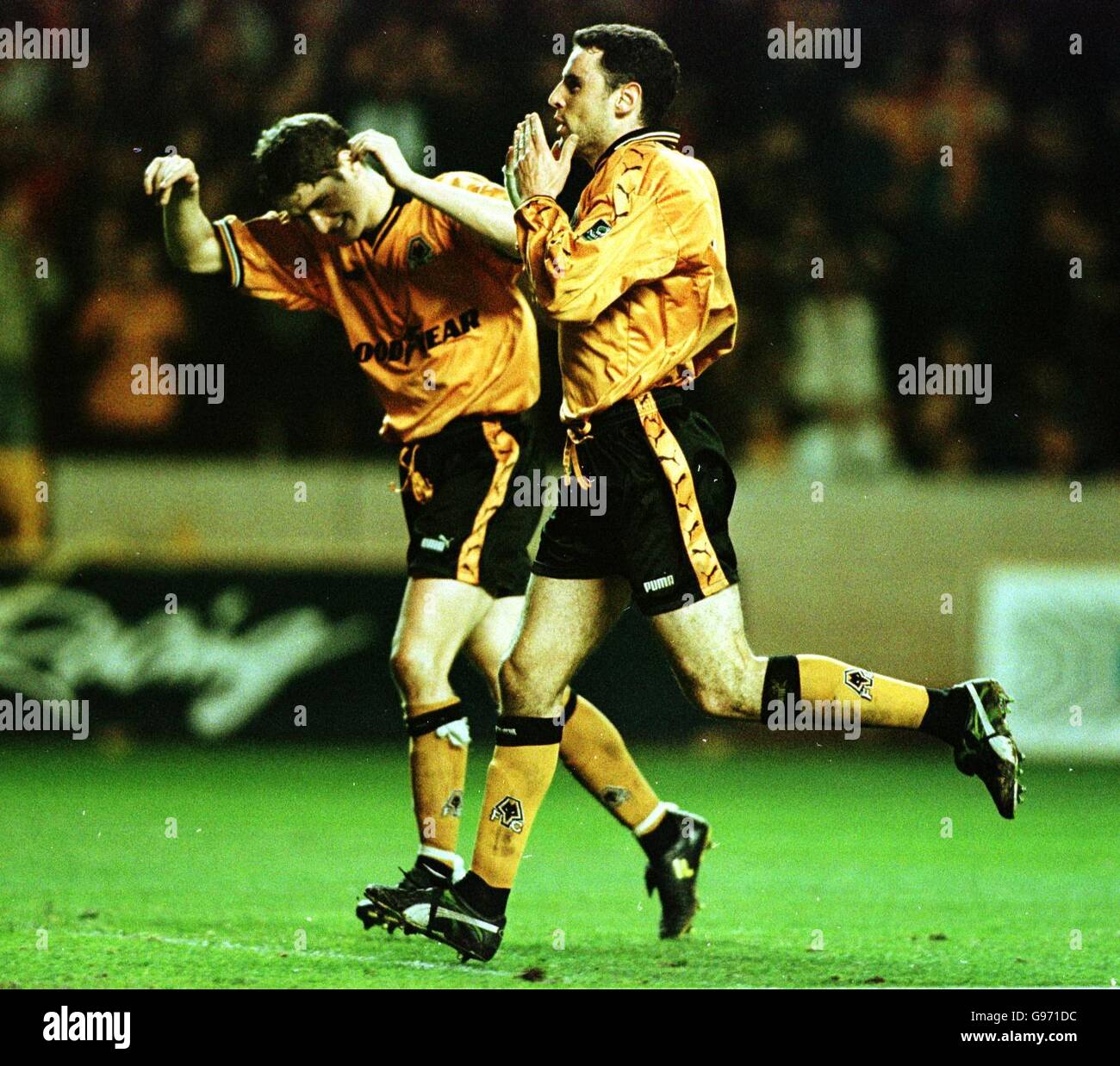 Wolves's Kevin Muscat celebrates his penalty with Carl Robinson Stock ...