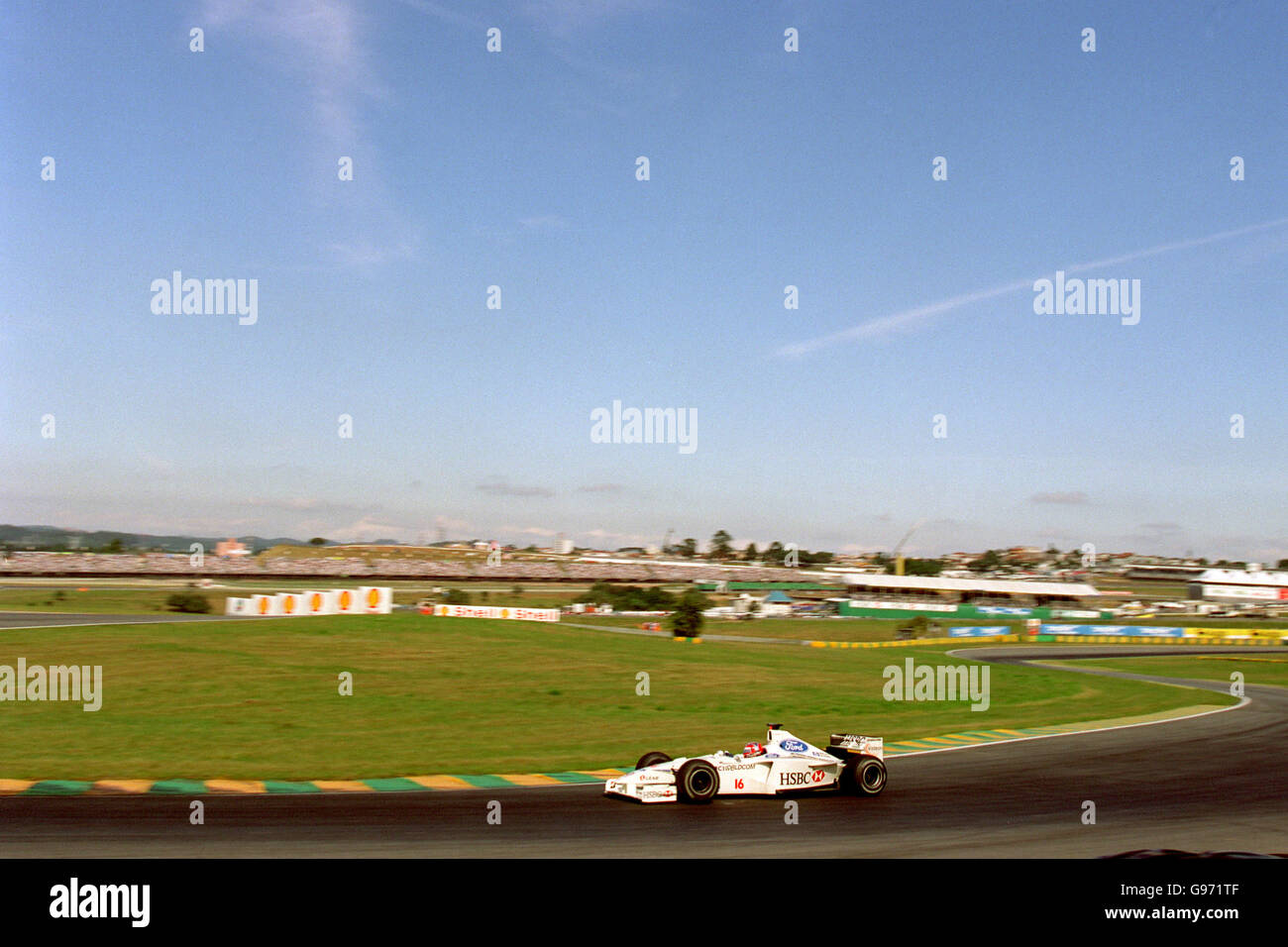 Home town boy Rubens Barrichello of Stewart Grand Prix leads the race ...