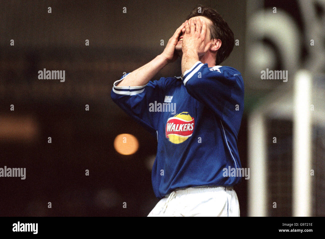 Leicester City's Tony Cottee covers his face after missing a chance ...