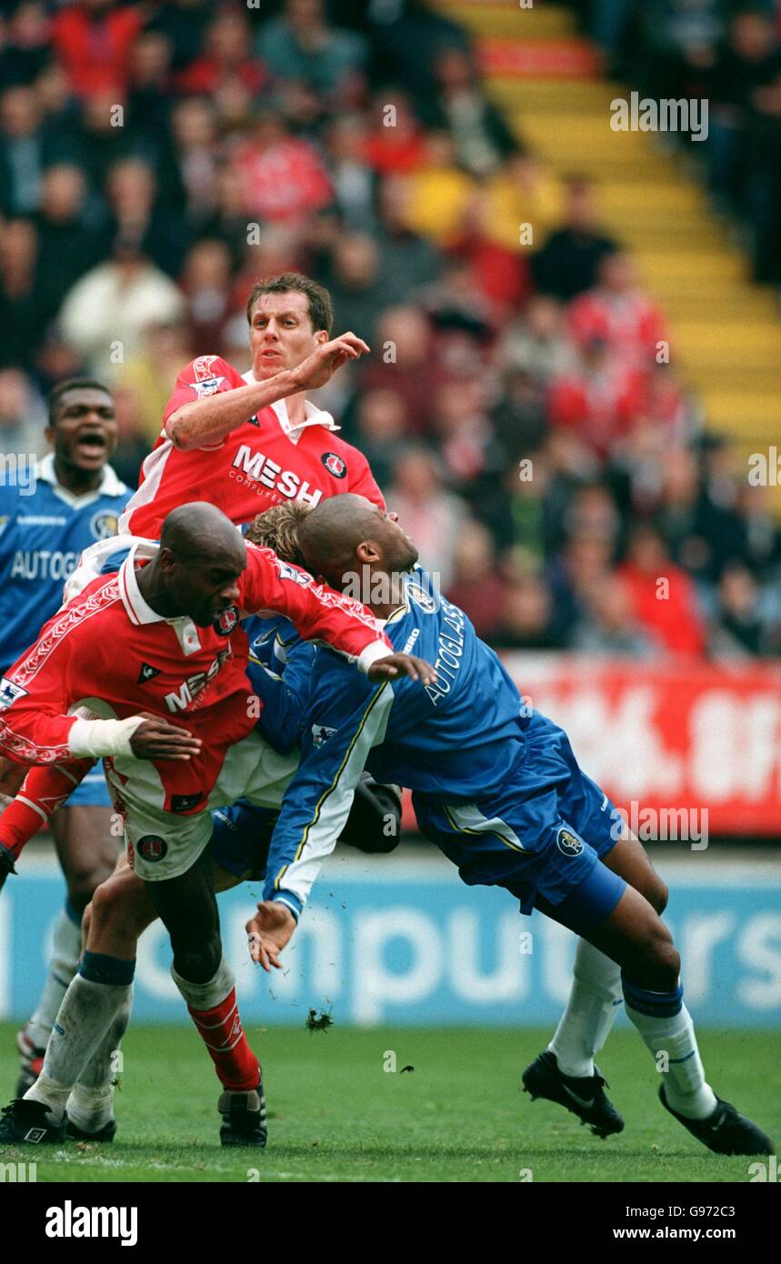 Charlton Athletic's Richard Rufus (left) and Carl Tiler (back) clash ...