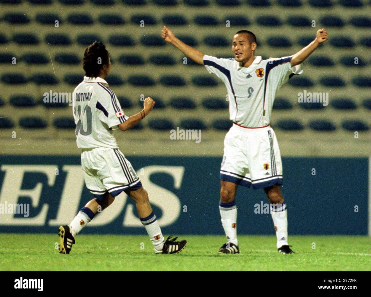 Japan's Naohiro Takahara (9) celebrates scoring the first goal as Japan ...