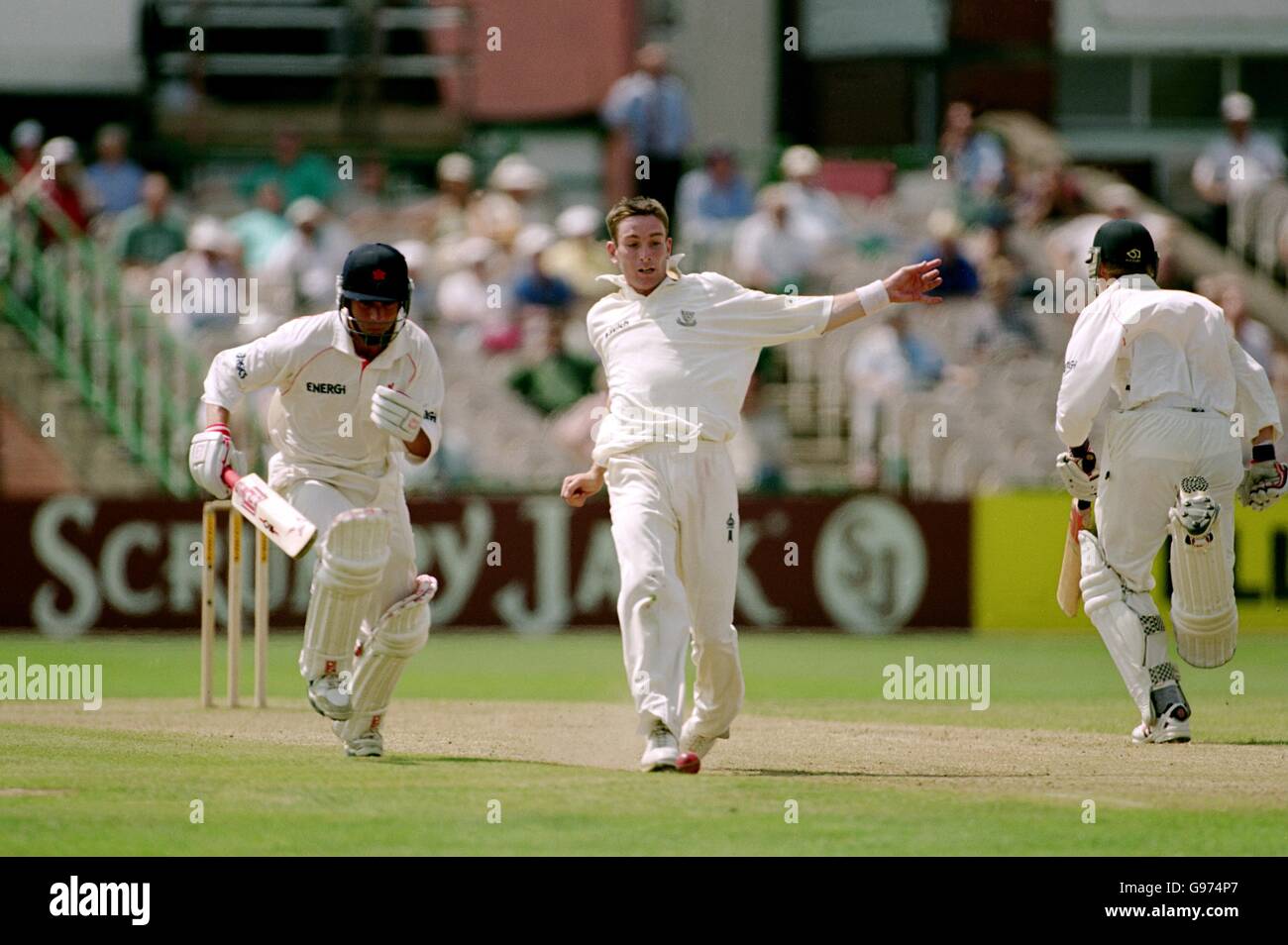 Lancashire's Graeme Lloyd runs for his ground as Sussex's James Kirtley ...
