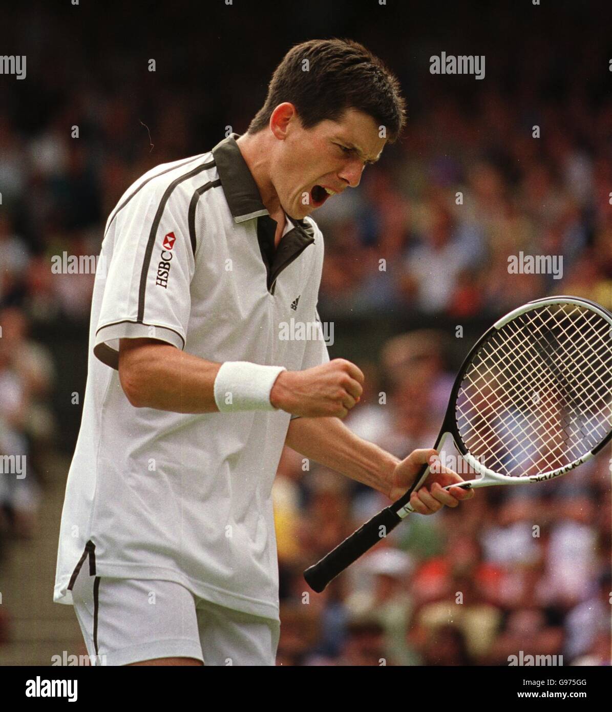 Tim henman celebrates on his way to victory hi-res stock photography ...
