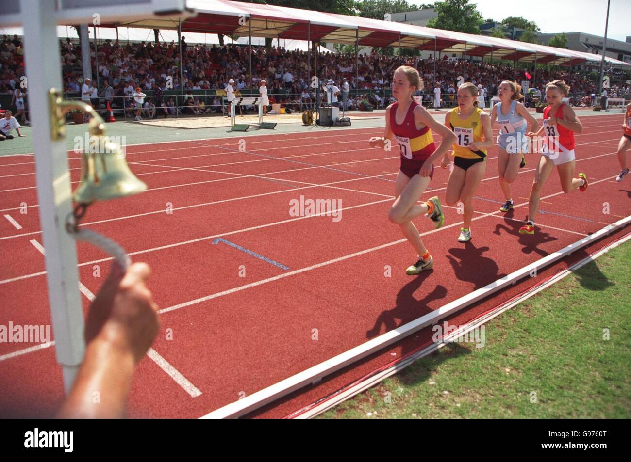 Athletics last lap bell hi-res stock photography and images - Alamy
